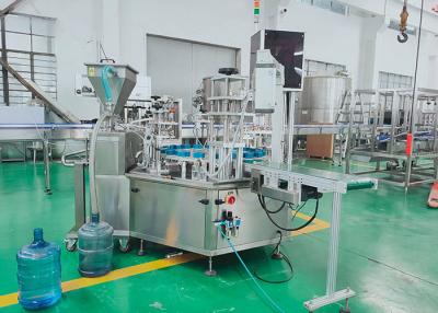 Cina macchina imballatrice liquida automatica di 1L 0.5MPA 2500kg in vendita