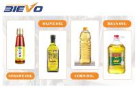 China Electric 4 Head 20000 BPH Automatic Oil Filling and Packing Machine for sale