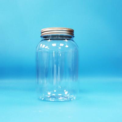 China Food Grade Clear PET Plastic Round Jar Aluminum  Screw Flat Cap For Food Candy Nuts for sale