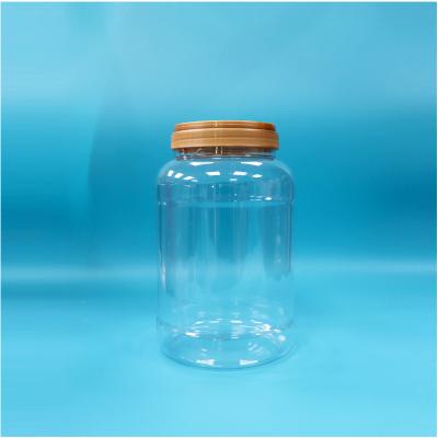 China Transparent Round Wide Mouth PET Plastic Milk Powder Spoon Jar Handle Brown Cap for sale