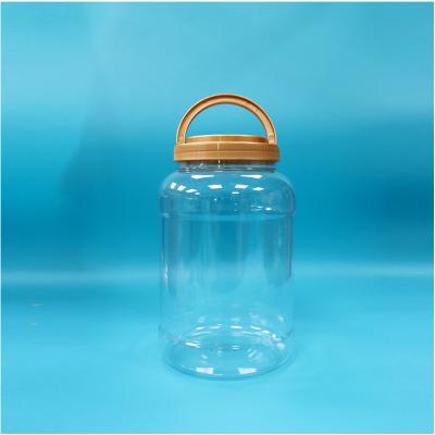 China Bpa Free Handle Cap Transparent Round Wide Mouth PET Plastic Milk Powder Spoon Jar for sale