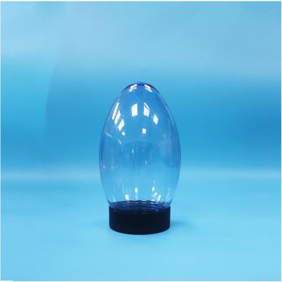 China Unique Egg-Shaped Plastic Candy Popcorn Pistachio Nut Jar Upside Down Screw Cap for sale