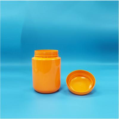 China Screw Lid Round Shape Orange Plastic Jar For Cereals Multi-Grain Walnut Peanut for sale