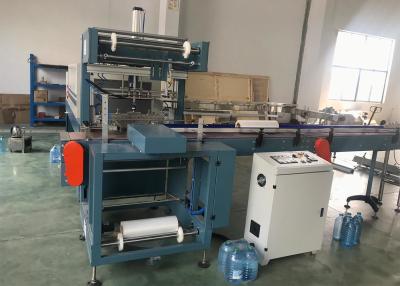 China Semi - Automatic Water Bottle Shrink Packaging Equipment Fast Packing Speed for sale