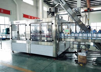 China Rotary PET Bottle Filling Machine Mineral Water Rinsing Washing And Capping for sale