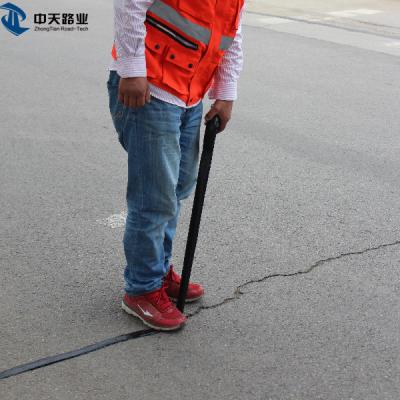 China 6cm X 3mm  Self Adhesive Driveway Bituminous Tape Instant Asphalt Sealing Crack Sealing for sale