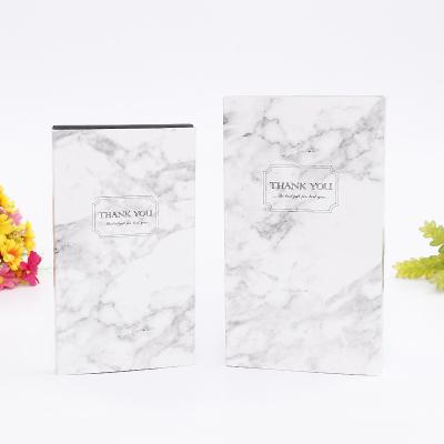 China Marble Grid Mobile Case Packaging Box Matt Plastic Window Cardboard Blister Packaging for sale