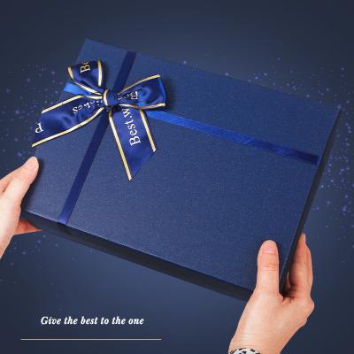 China Custom Luxury Rectangular Blue Paper Box With Bowknot , Coated Paper Gift Packaging Box for sale