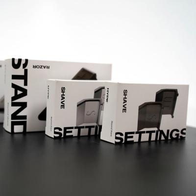 China Custom Logo Tuck In Razor Setting Packaging Box White Paper Box With EVA Tray for sale