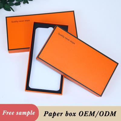 Cina Orange Custom Logo Phone Case Paper Packaging Box Custom Lid And Base all'ingrosso in vendita