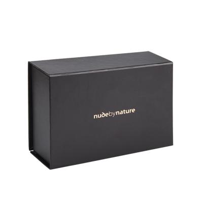 China Custom Logo Black Book Shaped Magnetic Gift Box Rigid Cardboard Package For Cosmetics for sale