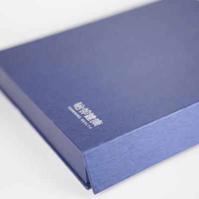 China Custom Logo Blue Clamshell Storage Boxes Gift Book Shape Packaging Box With EVA Tray for sale