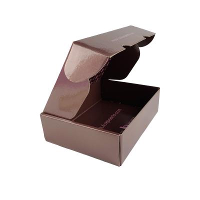 China Logotipo personalizado Caja de papel ondulado brillante Caja de embalaje Caja de regalo plegable Cajas de regalo en venta
