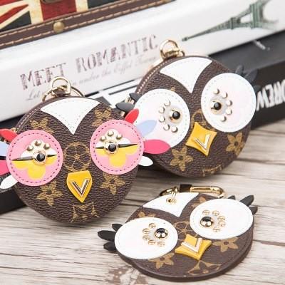 China LV Coin purses mini round bag keychain cock hen change purse earphone storage wholesale replica for sale