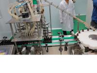 China Automatic 4 Heads Filling And Capping Machine For Fluid Material Processing for sale