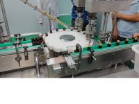China Automatic 4 Heads Filling And Capping Machine For Fluid Material Processing for sale