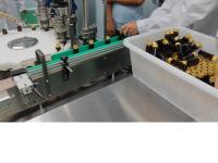 China Automatic 4 Heads Filling And Capping Machine For Fluid Material Processing for sale