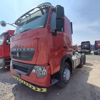 China Modelo de camión HOWO T7h 440 rojo para el transporte de carga pesada dentro de un semirremolque remolque en venta