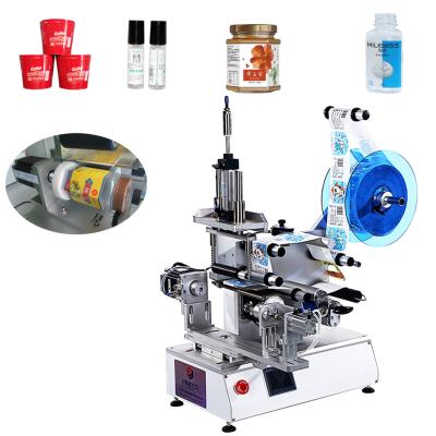 Cina Square Bottle Labeling Machine FK616 High Precision Semi-automatic Glass Jar Sticker Square Sanitizer Bottle Sleeve Square Bottle Labeling Machine Applicator in vendita