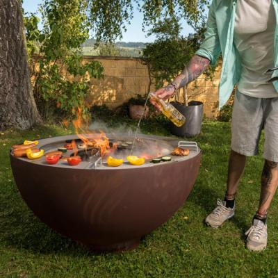 Cina BARBECUE d'acciaio all'aperto del pozzo del fuoco di 1000mm Corten con l'anello su misura della griglia in vendita