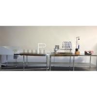China Semi-Automatic 2L Plastic Mineral Water Bottling Line with 1000BPH Capacity and Adhesive Labeling Machine for sale