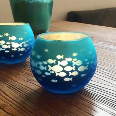 China Round electroplating ball shape candle holder with fish decoration for home decor for sale