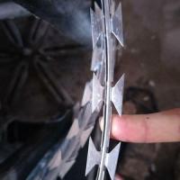 China Anti Rust Cbt 65 Razor Barbed Wire Security Hot Dipped Galvanized for sale