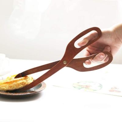 China Tesouras de múltiplos propósitos de madeira criativas do alimento da cozinha do grampo do pão dos utensílios de cozimento à venda