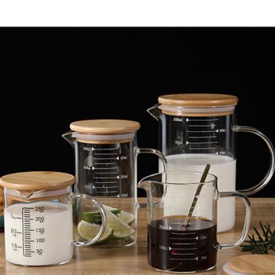 Cina Microonda Oven Borosilicate Glass Tea Cups 350ml 500ml 1000ml con il coperchio di bambù in vendita