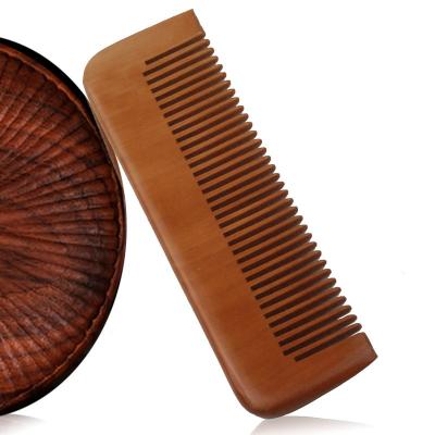 Cina Il pettine di legno fatto a mano di massaggio di mogano vecchio ha scolpito l'anti elettricità statica di perdita di capelli anti in vendita