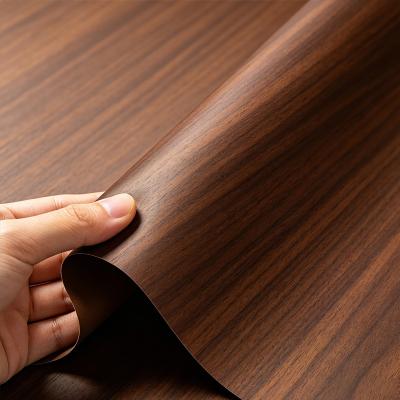 China Matte Dark Brown Walnut Decorative PVC Film Self Adhesive Furniture Film Wrap OEM Size for sale