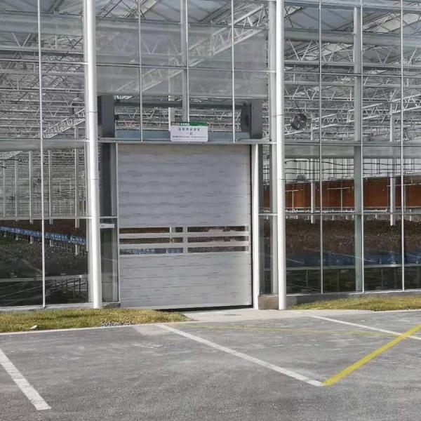 Quality 0.75-1.5KW Anti Wind Spiral High Speed Door For Ambient Food Processing Plants for sale