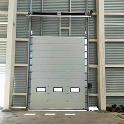 China 380V 220V Industrial Sectional Door Convenient Operation For Vehicle Service Centers for sale