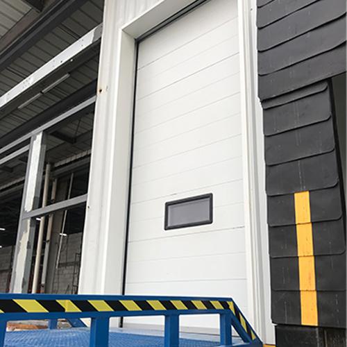 Quality Heavy Duty Sectional Overhead Door 24dB Sound Insulation Commercial Sectional Garage Doors for sale