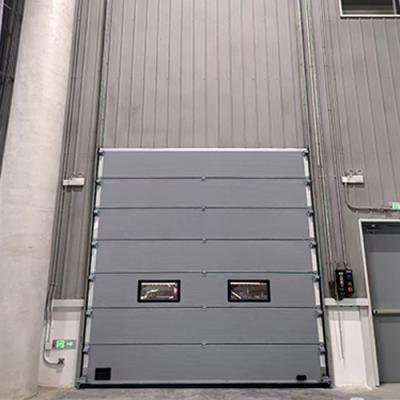 China High-Frequency & Stable Operation Sectional Overhead Door For Logistics Transit Warehouses for sale