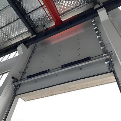 China Automatic Industrial Sectional Overhead Door Windproof With Pedestrian Window For Warehouse Loading Dock for sale