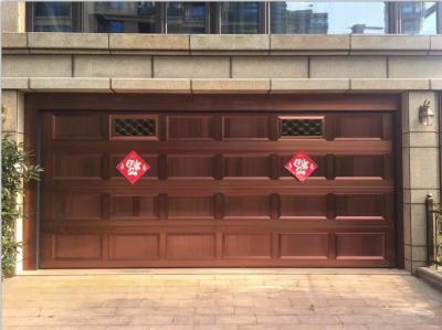 China Insulated Sectional Garage Door with Low Noise Motor and 40 mm Polyurethane Insulated Panels for Residential Use for sale