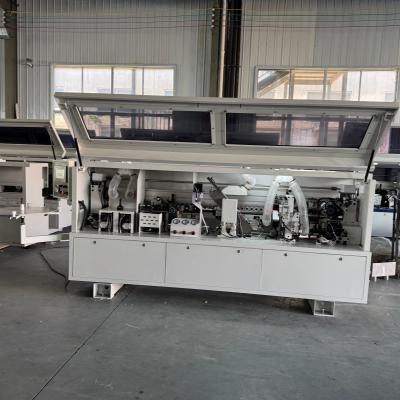 China BHM367Y Automatic Edge Banding Machine with 9KW Power 18~24m/min Speed for 10-60mm Woodworking Panels for sale