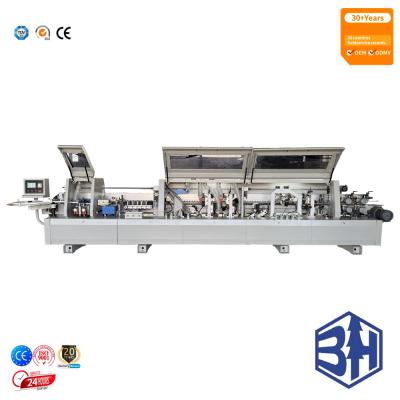 China Automatic Edge Banding Machine Featuring Automated Edge Band Feeding and Trimming for Streamlined Wood Panel Finishing for sale