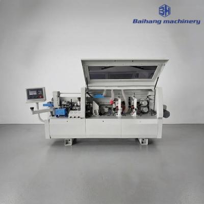 China Full Automatic Edge Banding Machine with PLC Microcomputer Control 16m/min Feed Speed for 10-60mm Panel Thickness for sale
