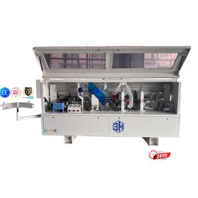China BHM368F High-Speed Automatic Edge Banding Machine with 18~24m/min Speed for 10-60mm Wood Panels and 7KW Motor for sale