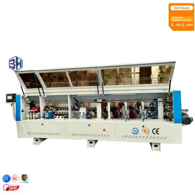 China Automatic Edge Banding Machine with 13.5kW Total Power 18-24m/min Adjustable Speed and 8 Core Working Stations for sale