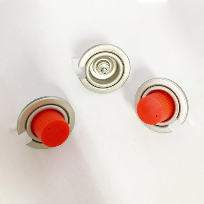 Disassembled view of butane gas stove valve components