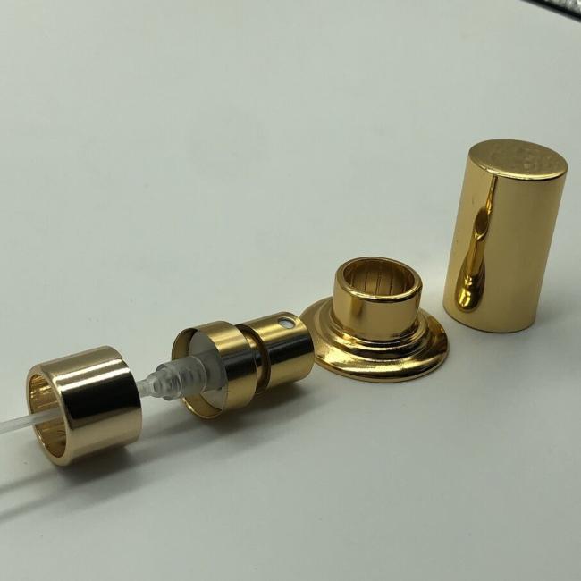 Perfume pump assembly with detailed components visible