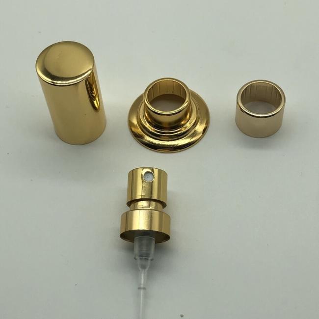 Luxury fragrance packaging featuring golden pump detail