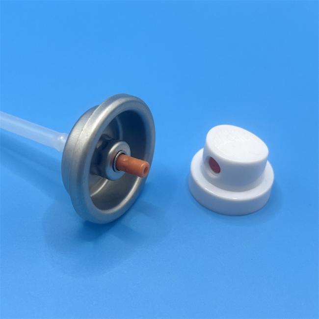 Shaving foam valve close-up view showing components