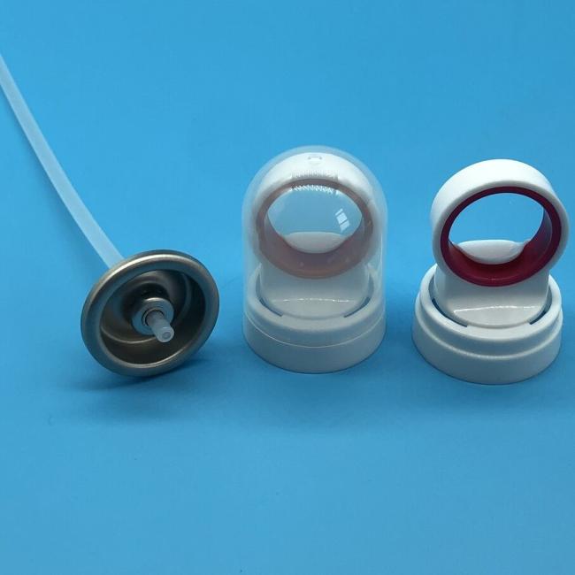 Close-up of sunscreen mist valve mechanism