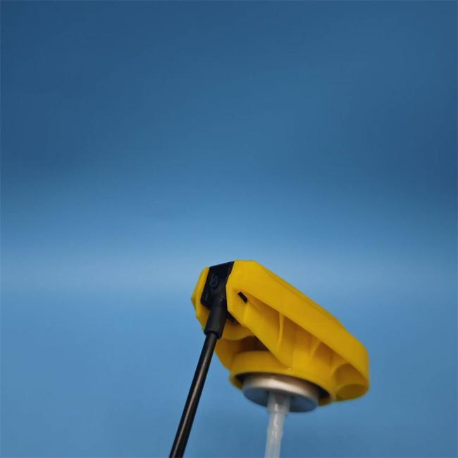 Close-up of dual-action spray nozzle with selector switch