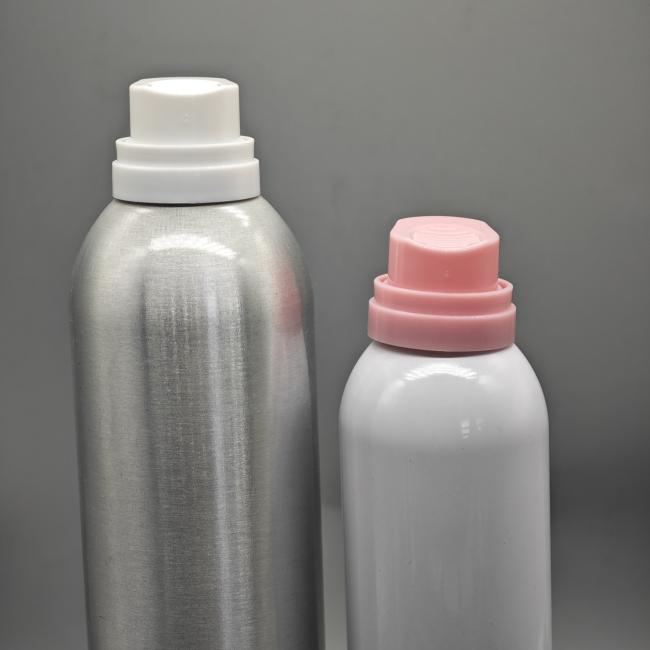 Close-up view of shaving foam aerosol valve and actuator showing detailed components