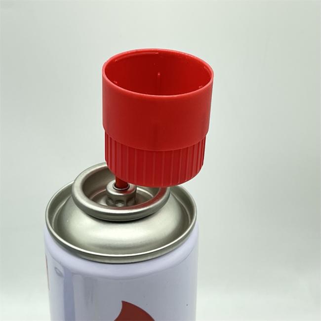 Close-up view of butane refill valve components